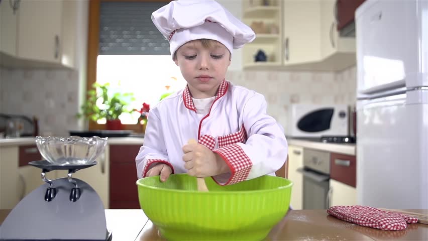 Close Up Of Kid Mixing Ingredients In Bowl Slow Motion Stock Footage ...