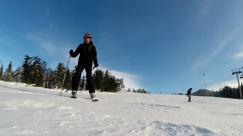 Skier Skiing Down the Slope Stock Footage Video (100% Royalty-free ...