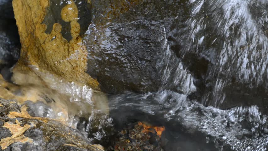 Water Flowing Through a Cold Stock Footage Video (100% Royalty-free ...