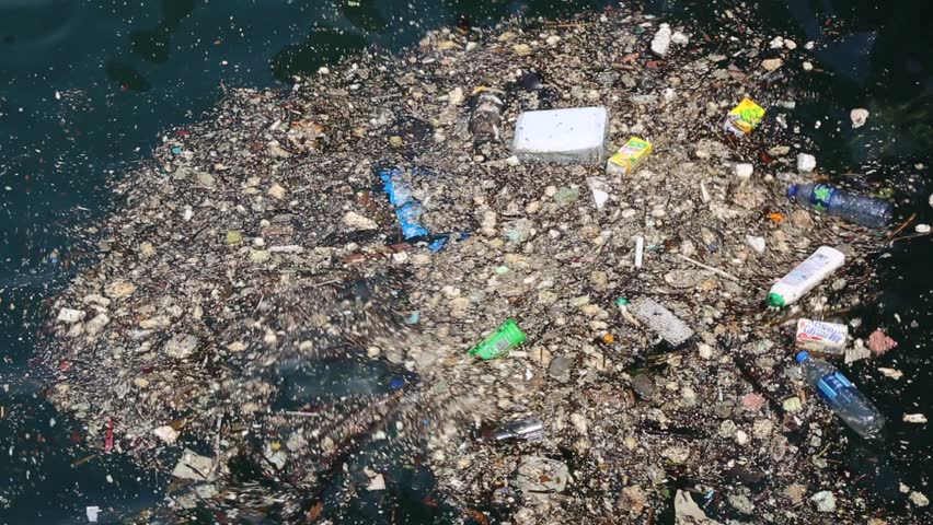 Video de stock de rubbish and pollution floating in water | 7059778 ...