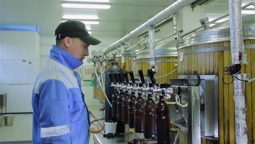 Operator CNC And Packaging Production/Worker Operates Industrial ...