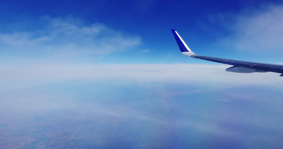 Stock video of jet plane flying through clouds. window | 7845088 ...