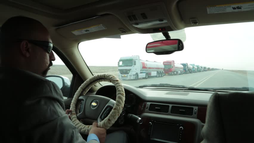Basra, Iraq, October 2014: A Back Seat Shot Of A Driver Driving His Car ...