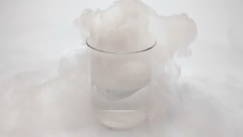 Pouring Soapy Water Into Glass With Dry Ice. Steam Bubbles. Stock ...